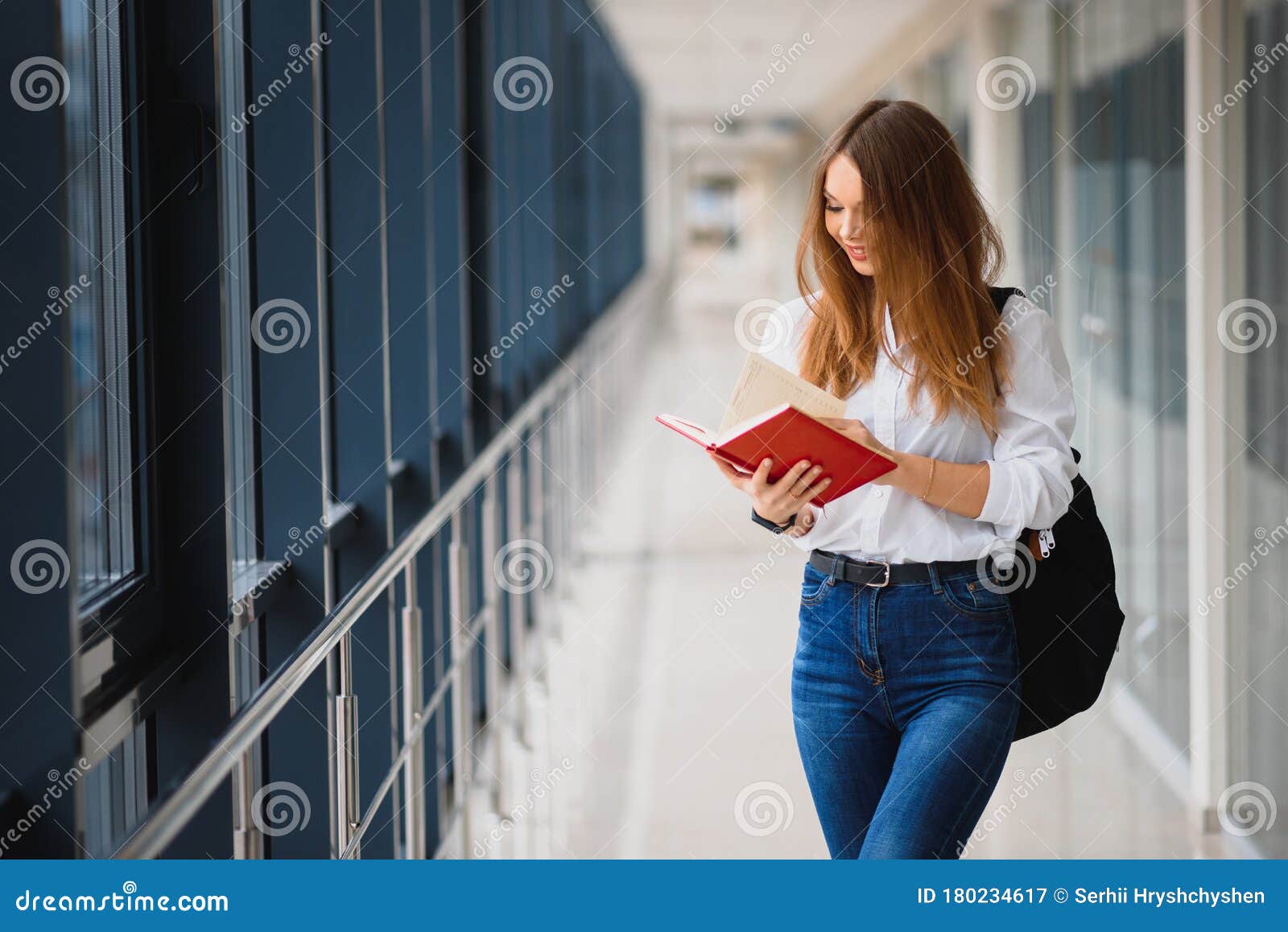 Smiling Female Student Enhancing Her Future by Attending Regular ...