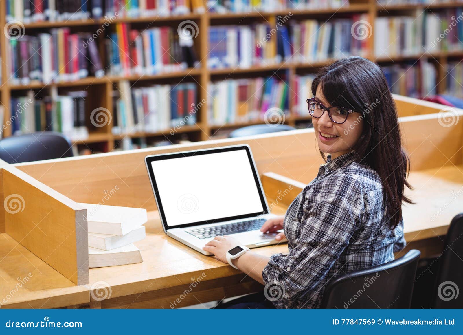 Smiling Female Student Using Laptop in Library Stock Image - Image of ...