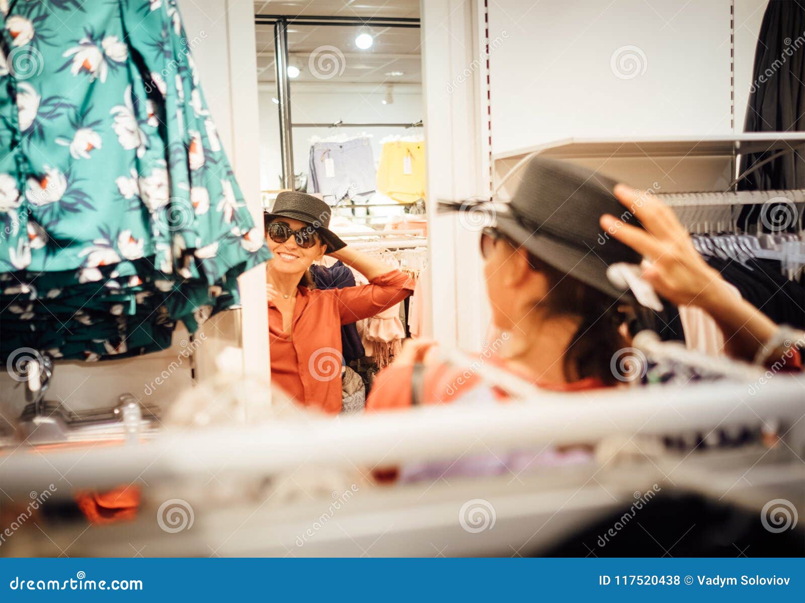 Smiling Female Try on the New Hat Look at Mirror Reflection. Stock ...
