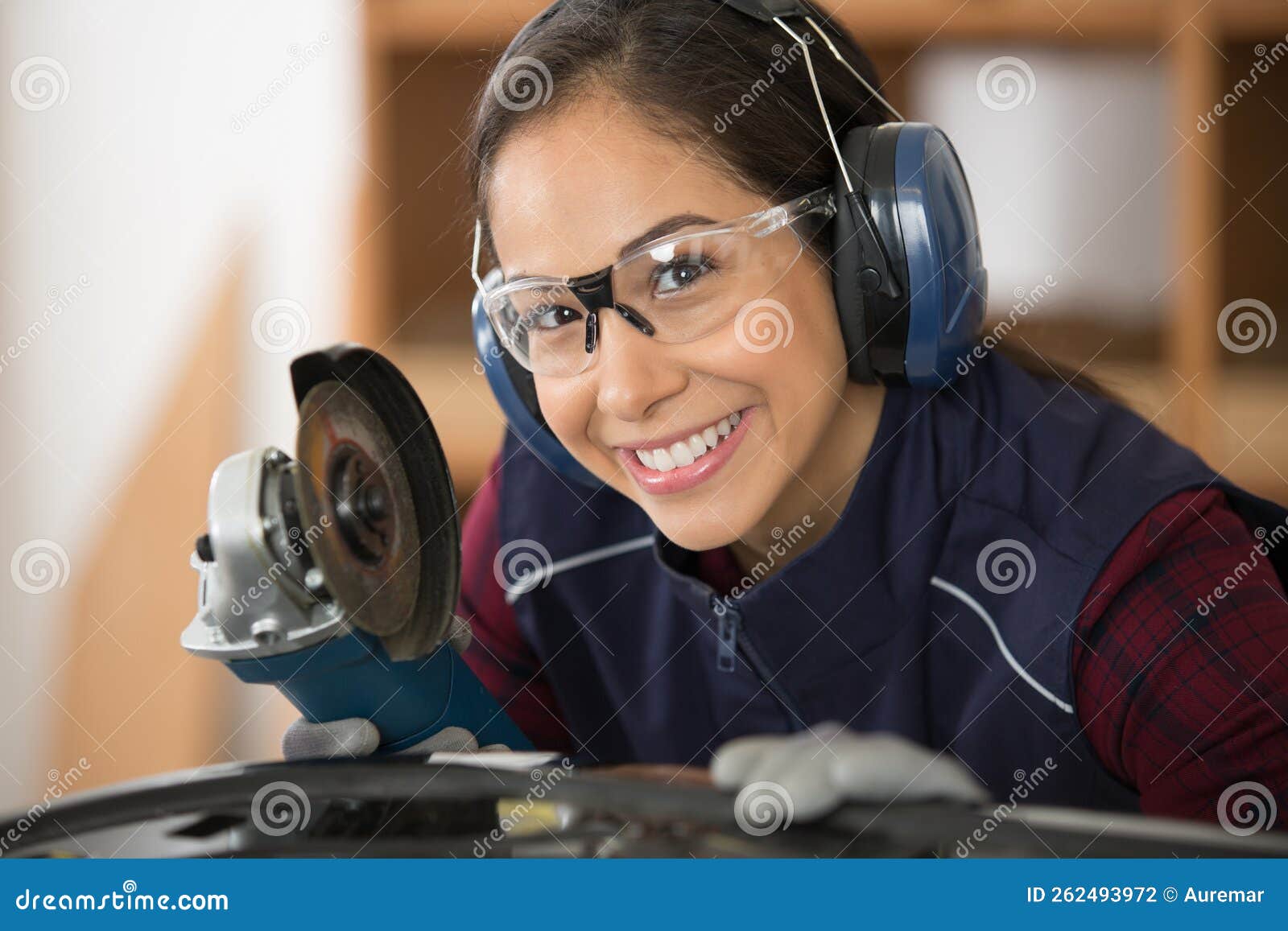 Smiling Female Worker Using Angle Grinder Stock Photo - Image of person ...