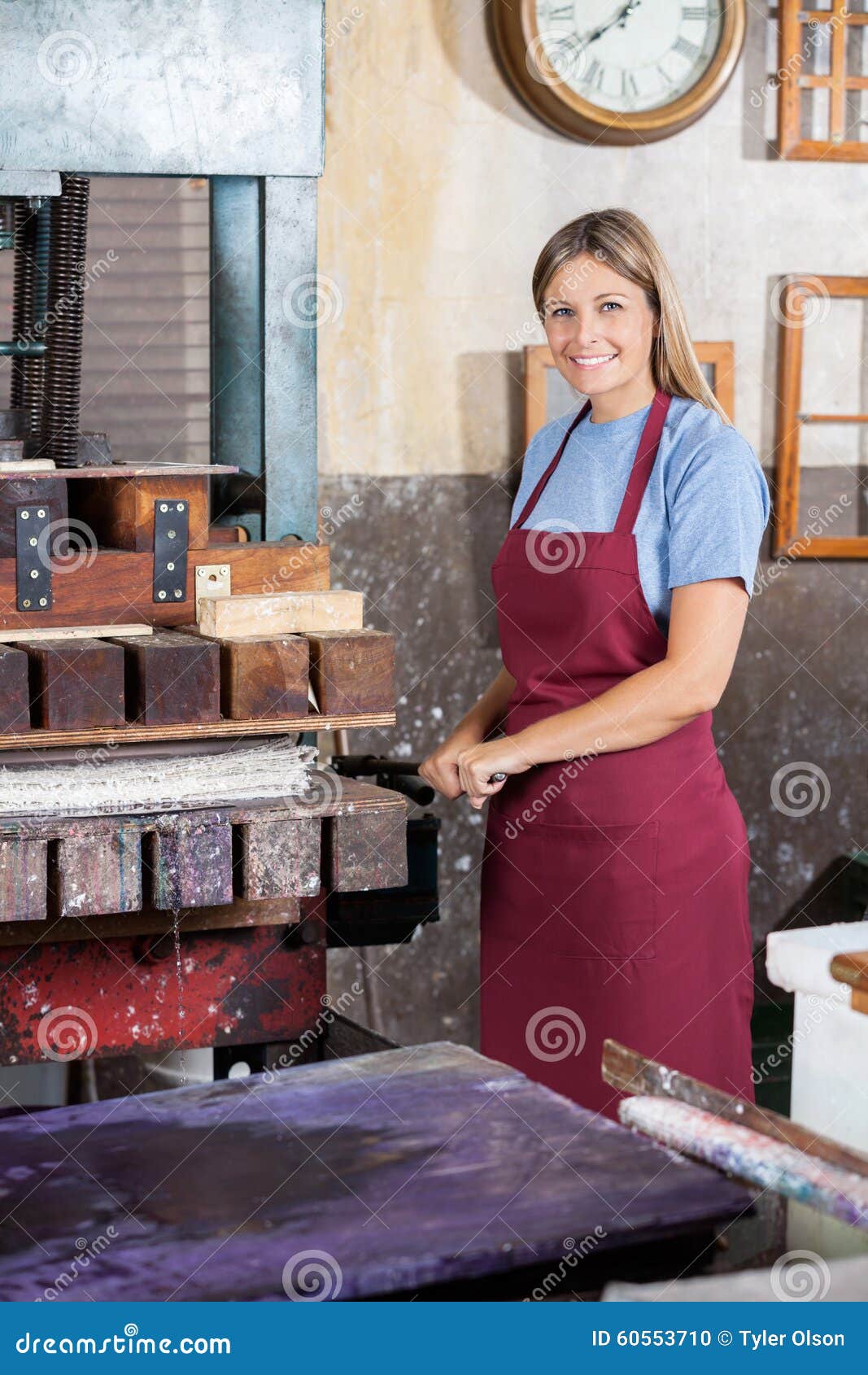 Smiling Female Worker Using Paper Press Machine Stock Photo - Image of ...