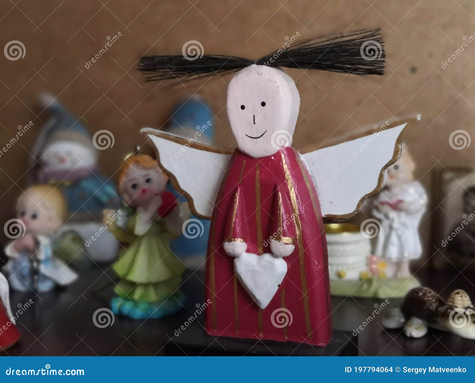 Smiling Figurine on the Shelf Stock Photo - Image of kids, figurine ...