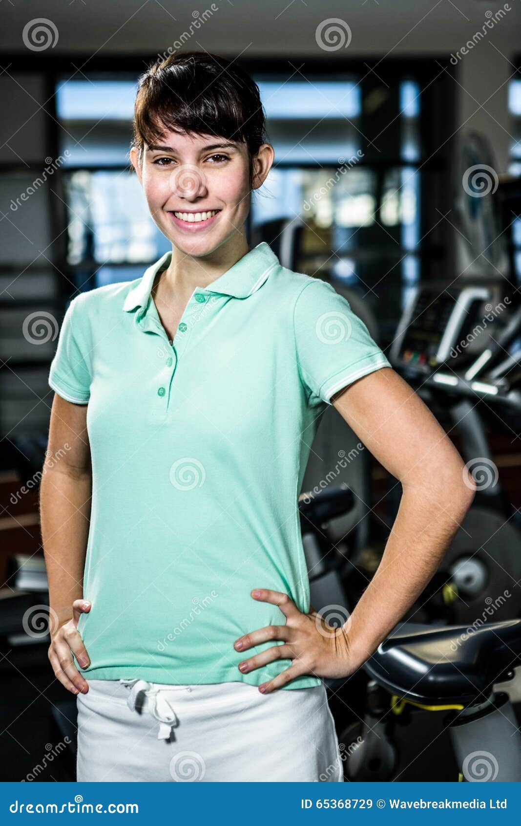 Smiling Fit Woman with Hands on Hips Stock Image - Image of female ...