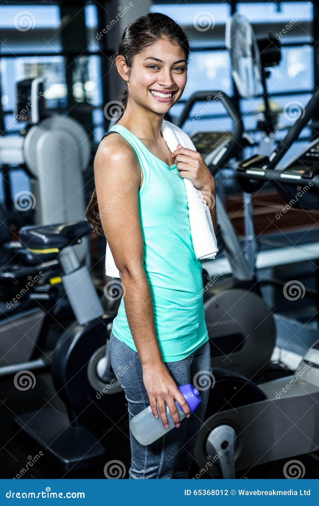 Smiling fit woman posing stock photo. Image of club, determination ...