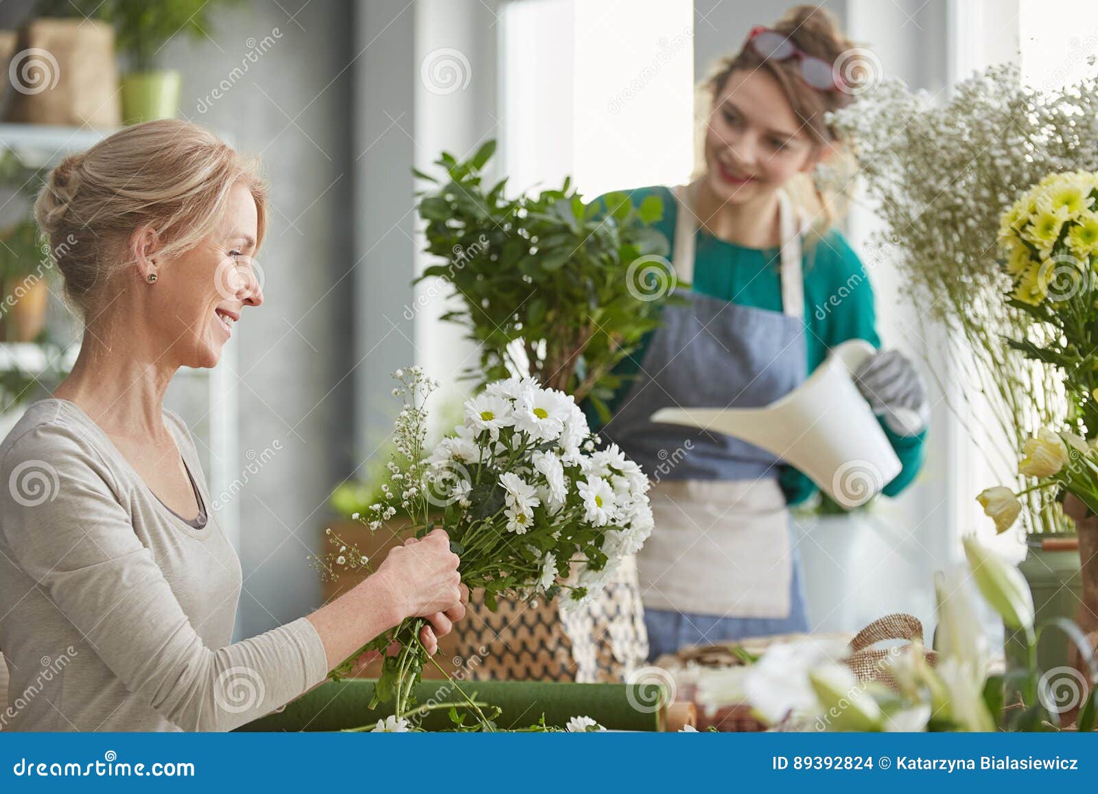 Smiling florists at work stock photo. Image of business - 89392824