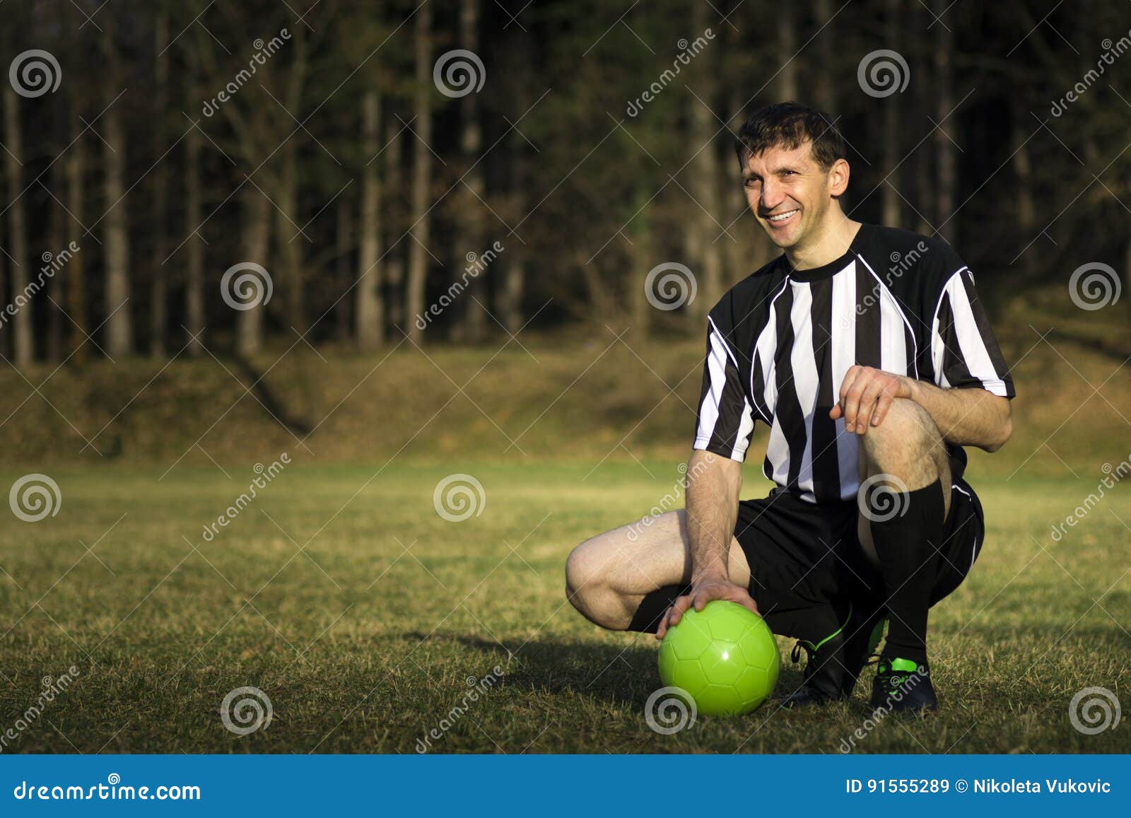 Smiling football player stock image. Image of uniform - 91555289