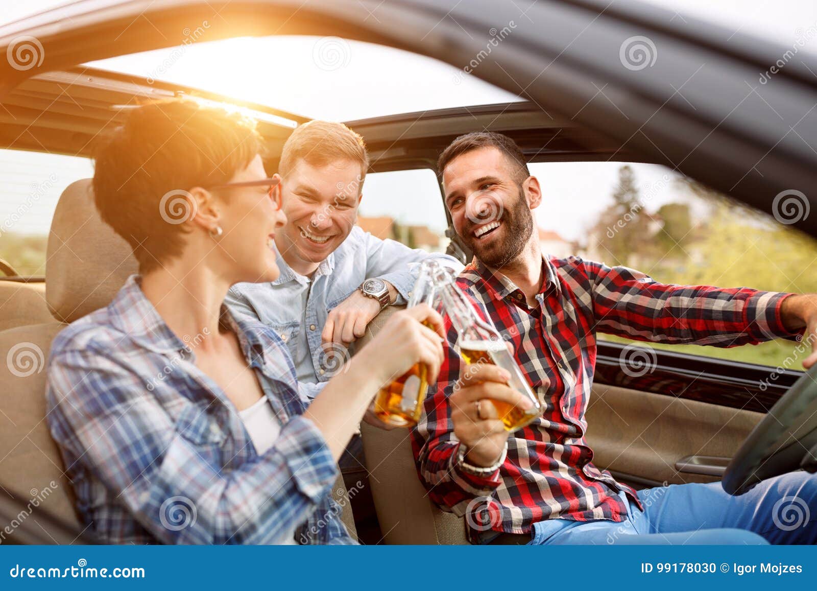 Smiling Friends Having Fun in the Car Stock Photo - Image of flare ...