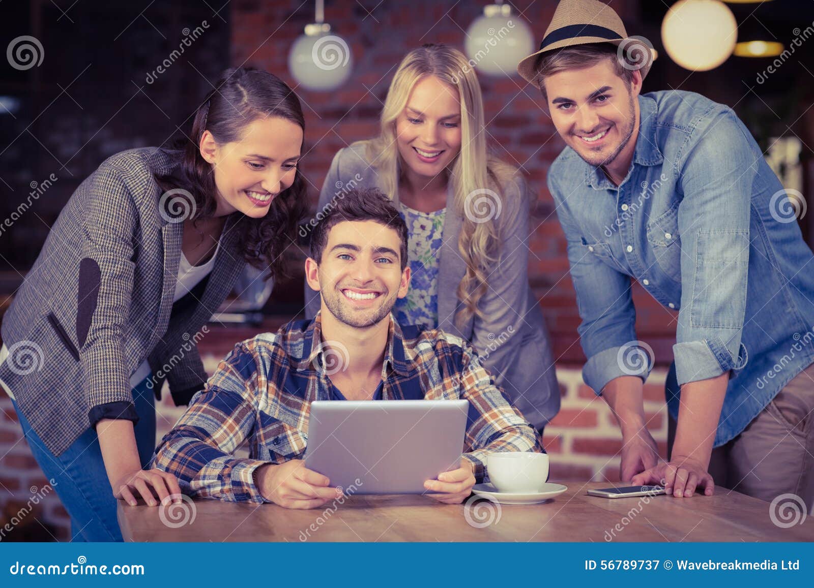 Smiling Friends Looking at Tablet Computer Stock Image - Image of ...