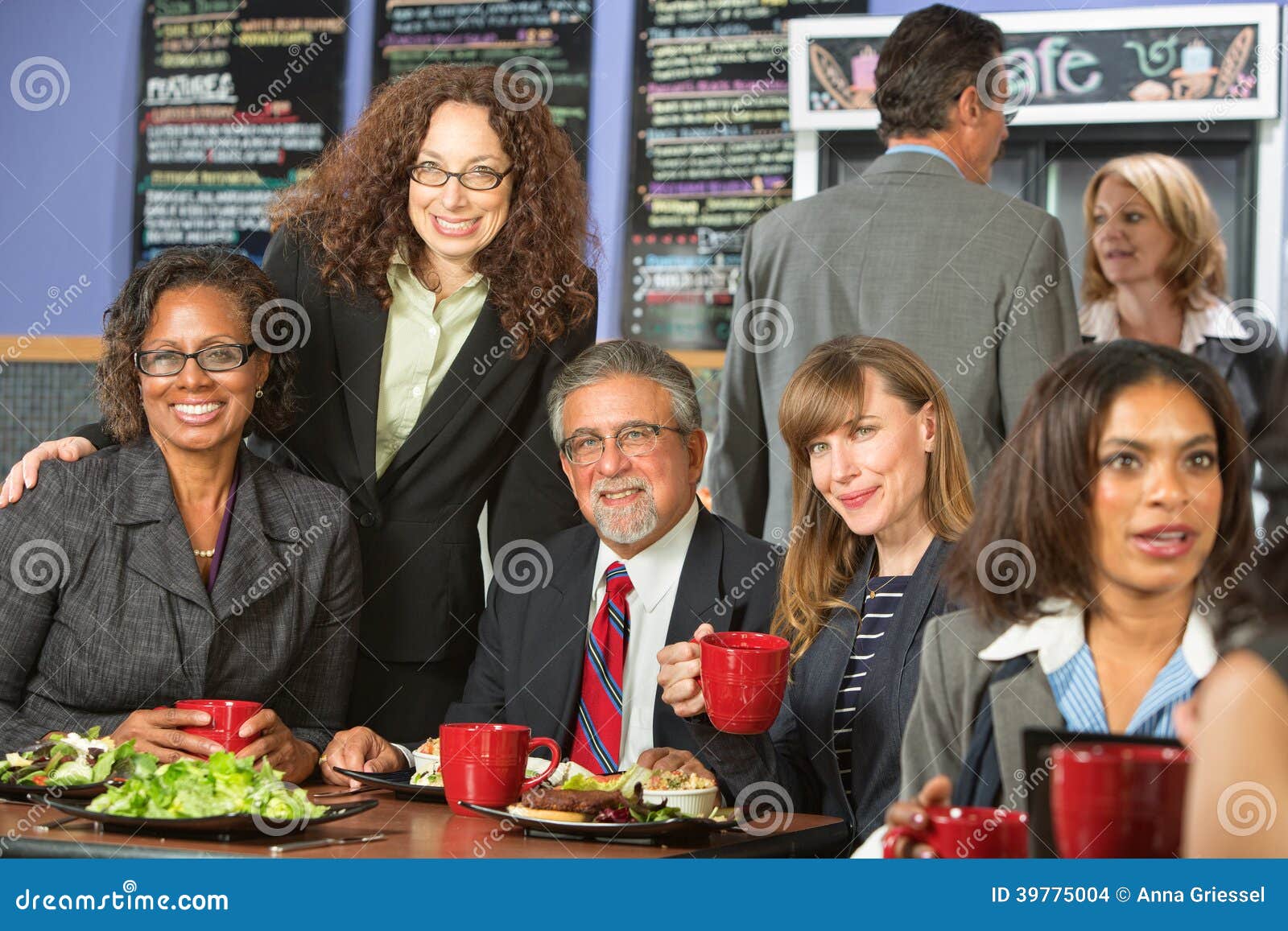 Smiling Friends at Lunch stock photo. Image of diversity - 39775004