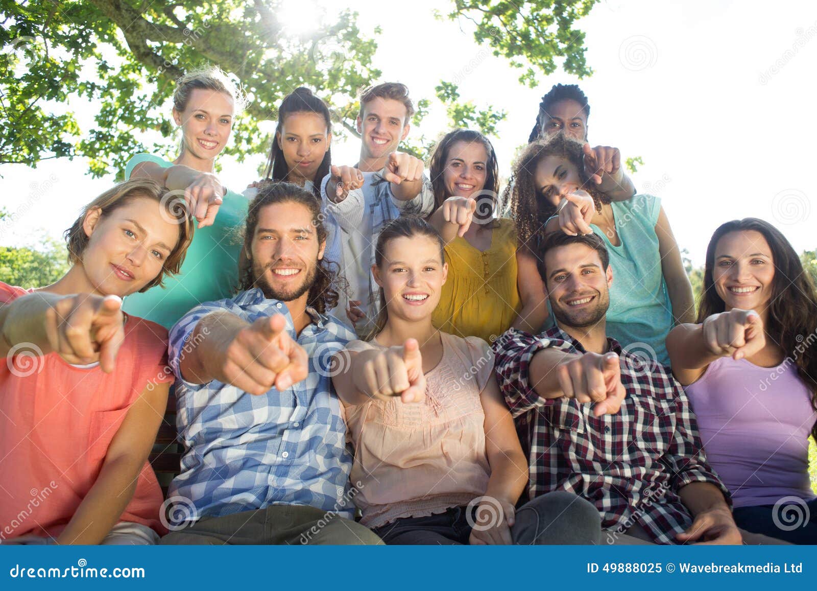 Smiling Friends Pointing at Camera Stock Image - Image of clothing ...