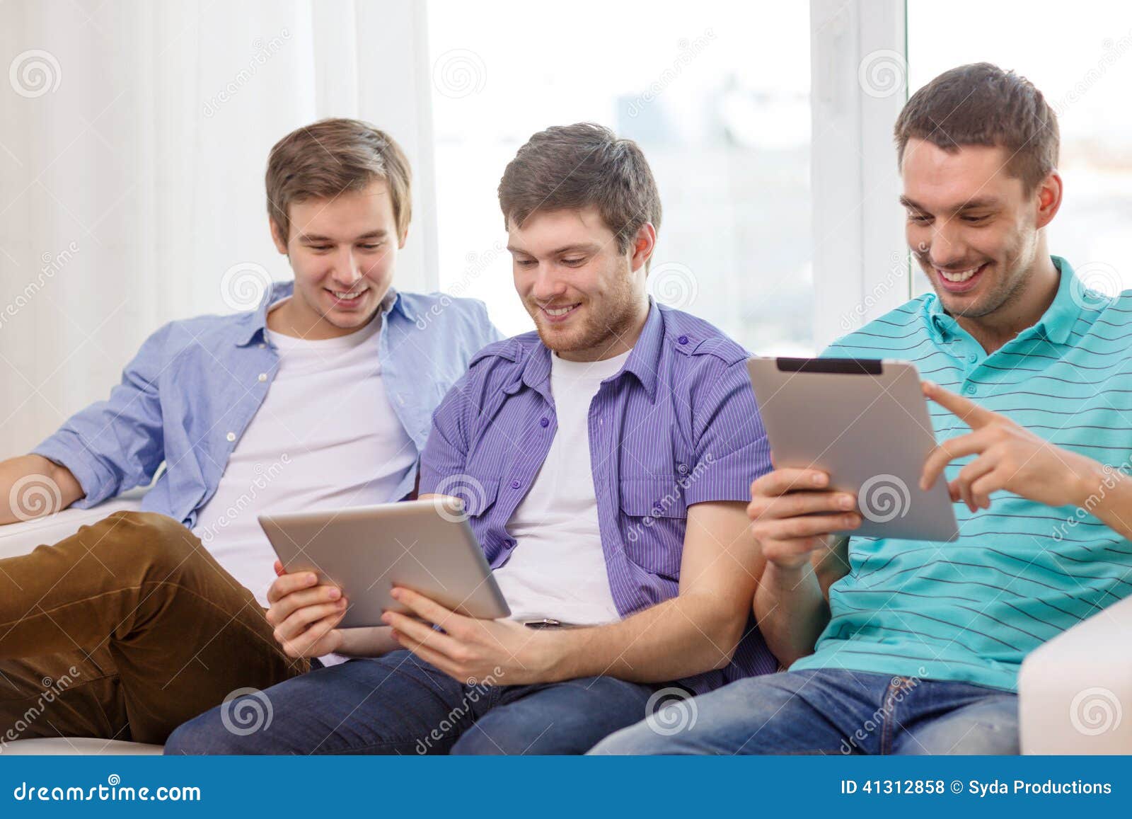 Smiling Friends with Tablet Pc Computers at Home Stock Photo - Image of ...