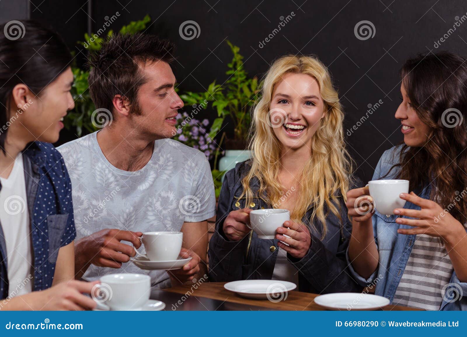 Smiling Friends Talking and Enjoying Coffee Stock Photo - Image of ...