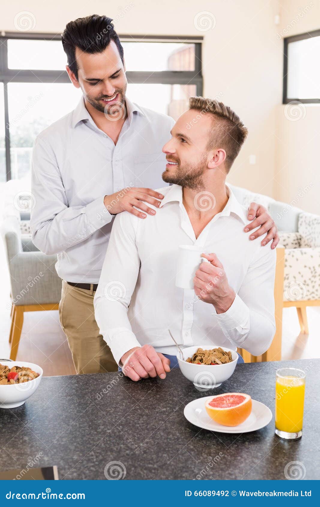 Smiling Gay Couple Having Breakfast Stock Photo - Image of caucasian ...