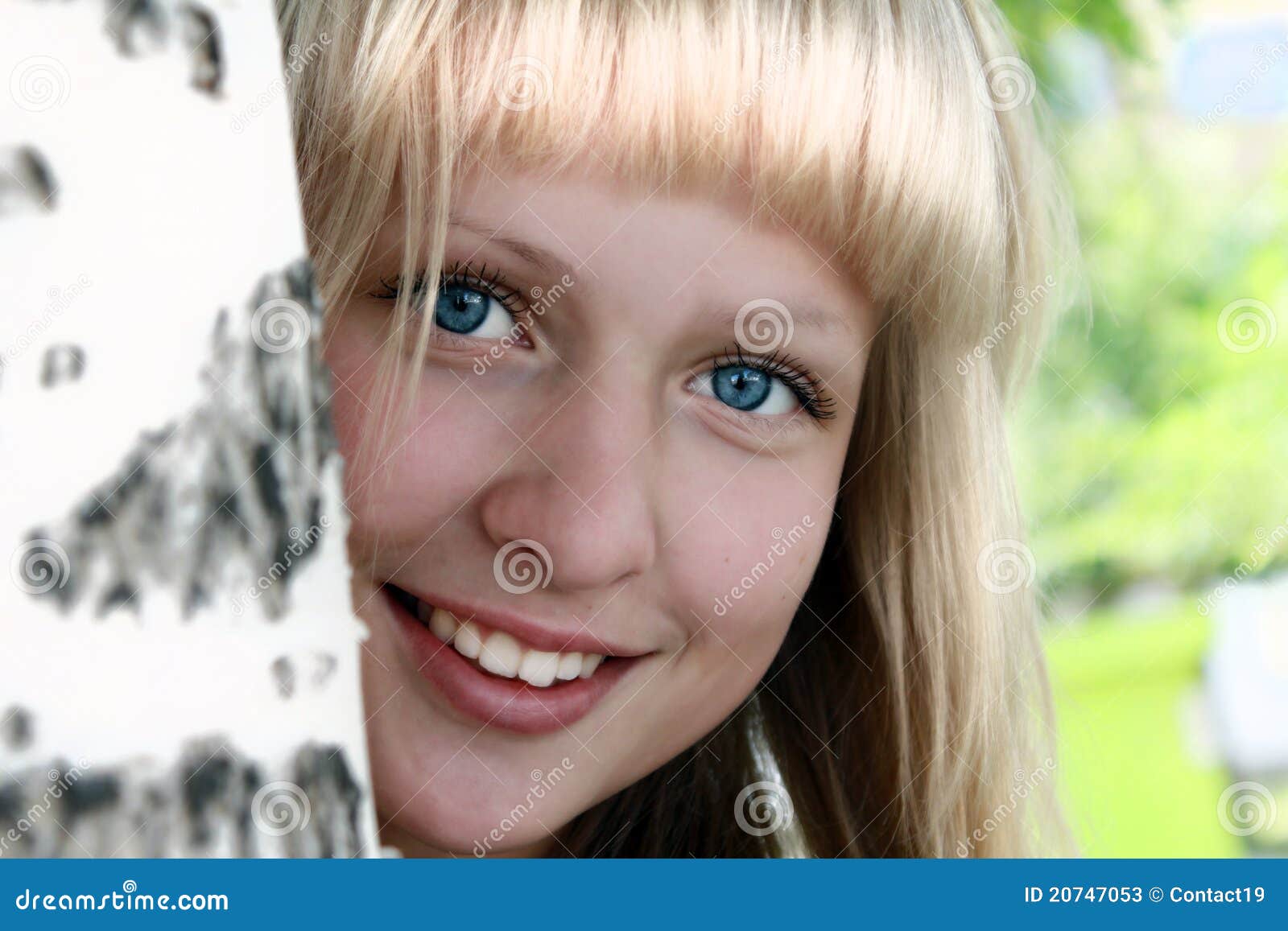 Smiling girl with a birch stock image. Image of nature - 20747053