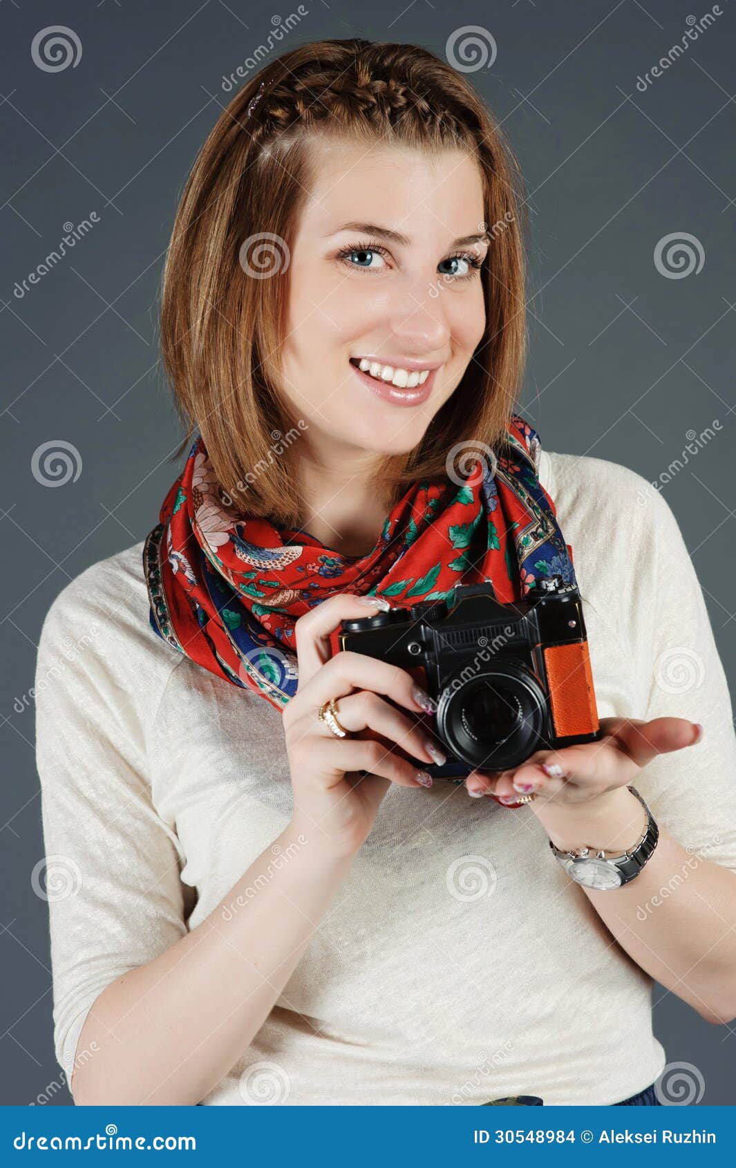 Smiling girl with a camera stock photo. Image of expression - 30548984