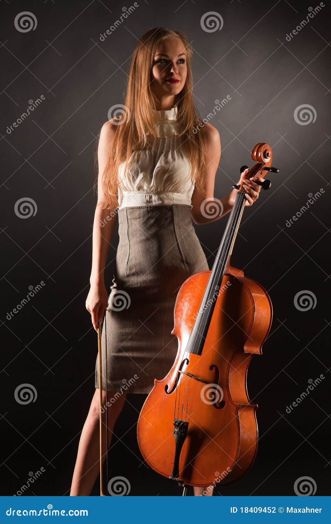 Smiling girl with cello stock photo. Image of isolated - 18409452