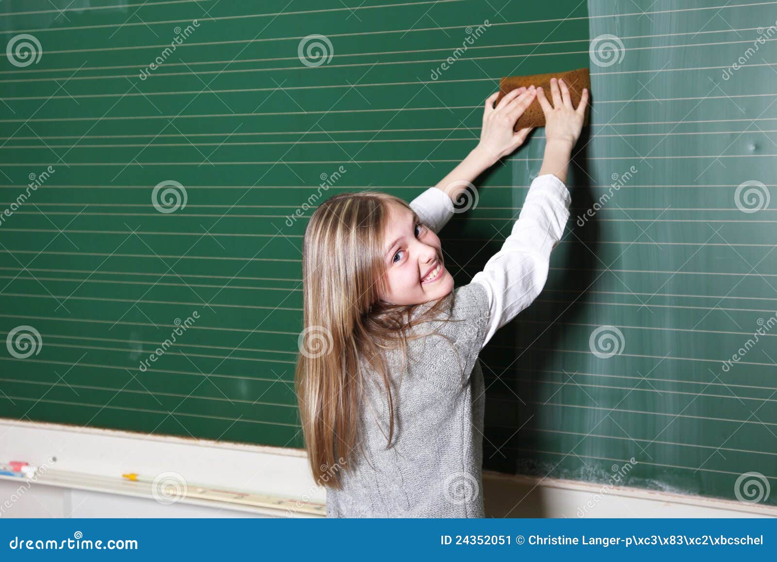 Smiling Girl Cleaning School Blackboard Stock Image - Image of ...