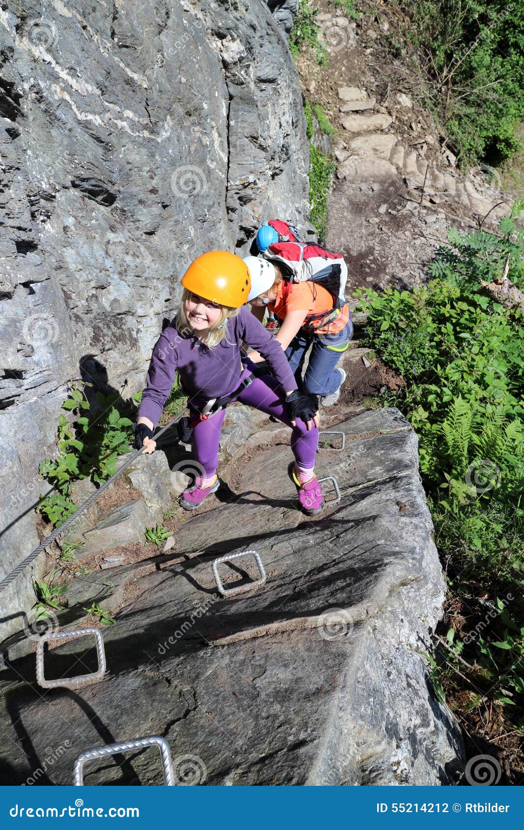 Smiling Girl is Climbing Up Stock Photo - Image of adrenaline, girl ...