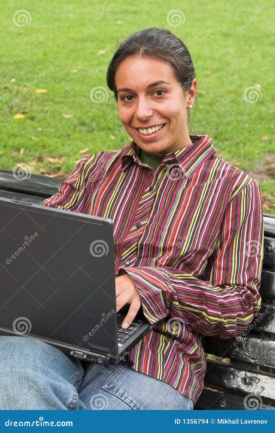 Smiling girl with computer stock photo. Image of college - 1356794