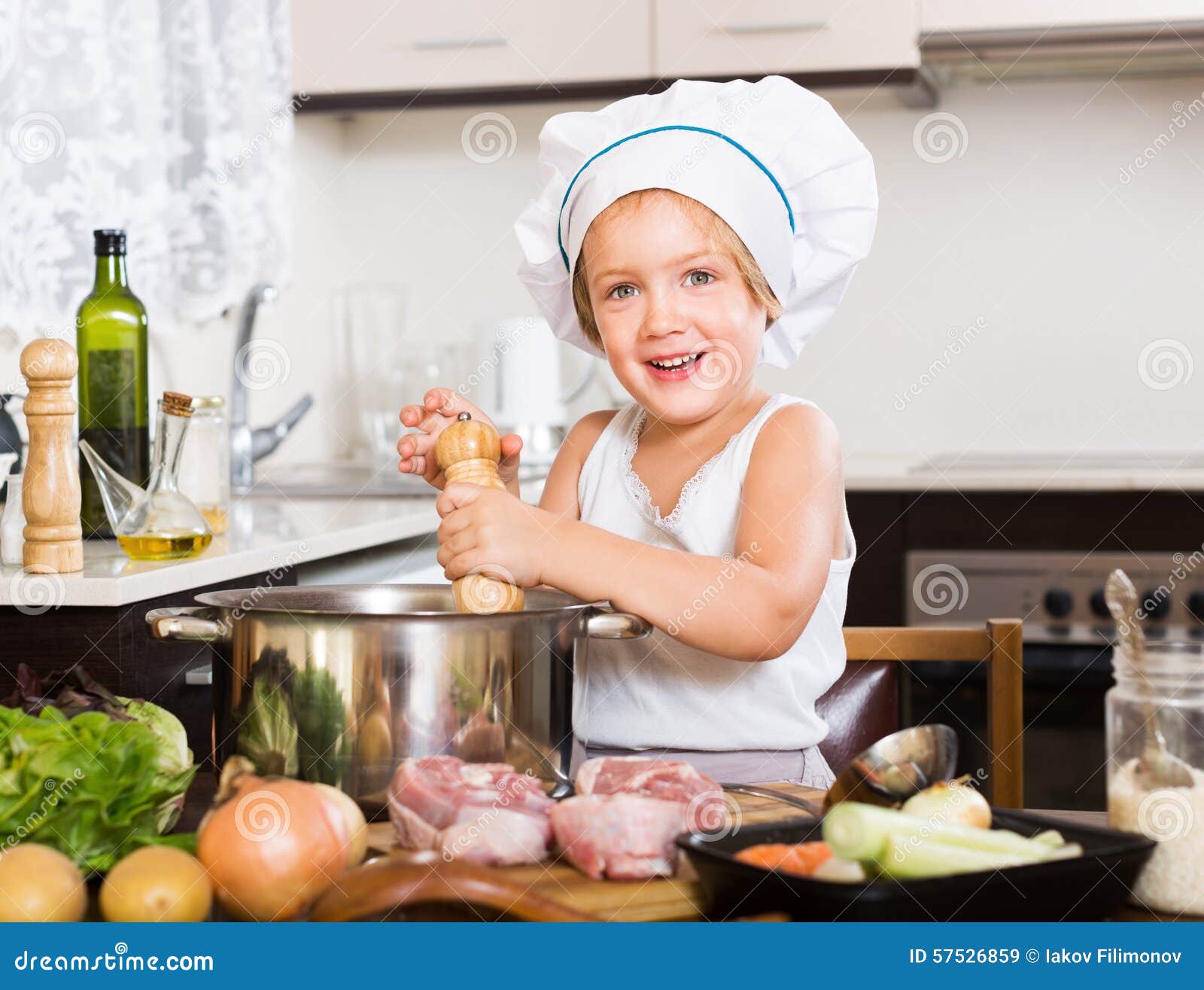Smiling girl cooking soup stock image. Image of kitchen - 57526859