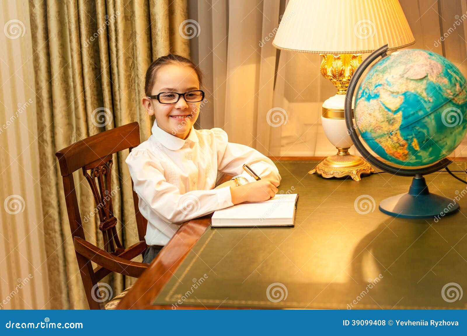 Smiling Girl Doing Homework at Classic Desk Stock Photo - Image of ...