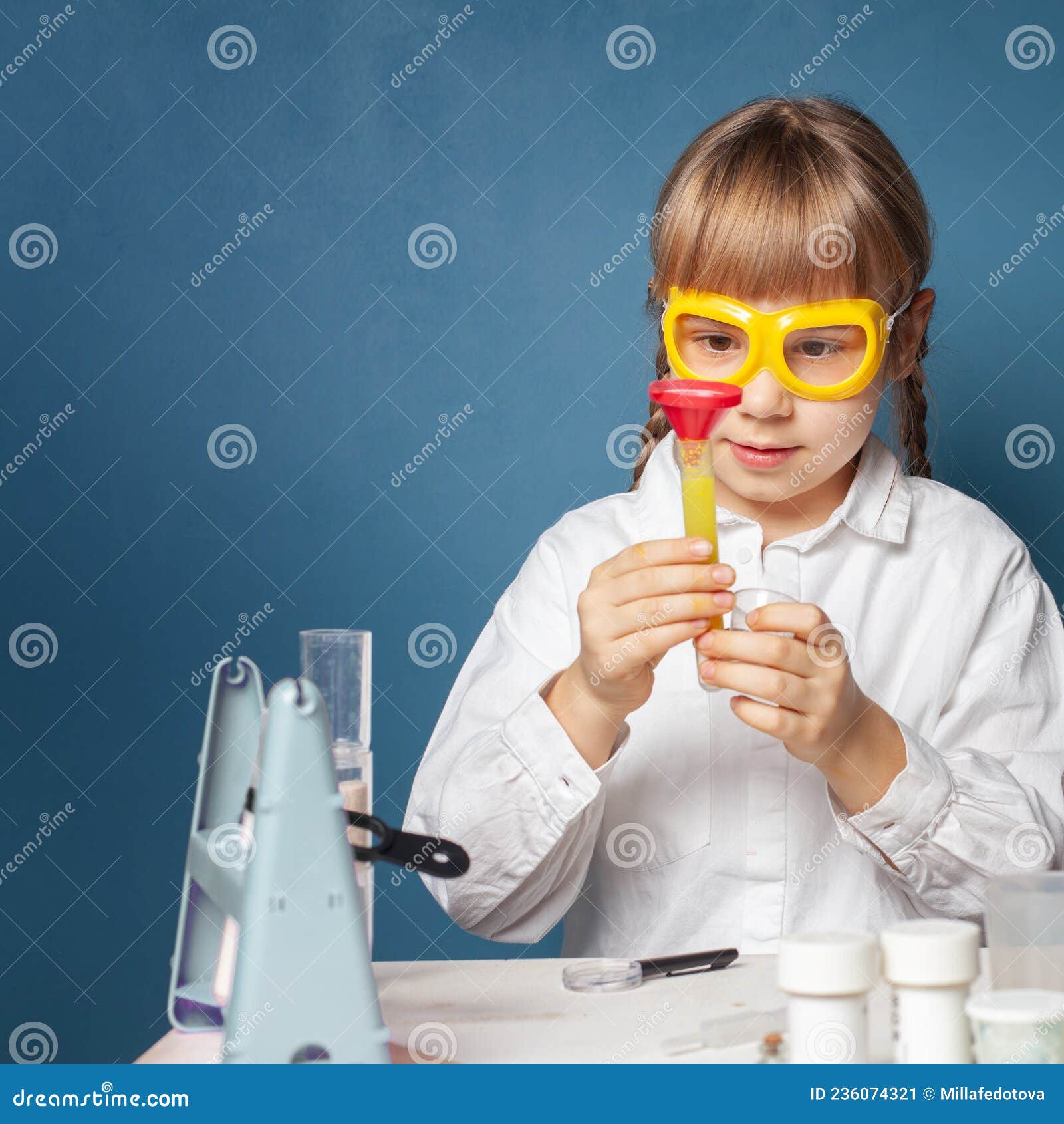 Smiling Girl Doing a Science Experiment for School Stock Image - Image ...