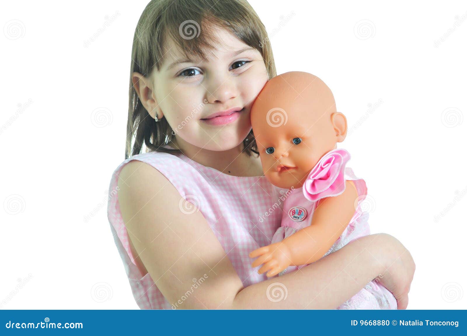 Smiling girl with doll stock photo. Image of daughter - 9668880