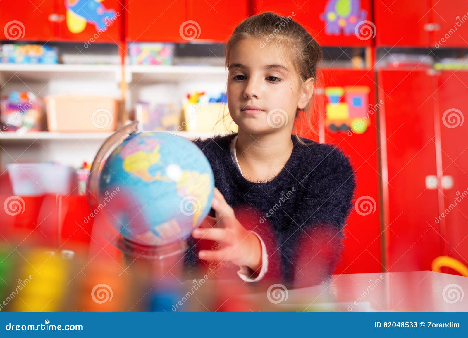 Smiling Girl Exploring Globe Stock Image - Image of planet, cute: 82048533
