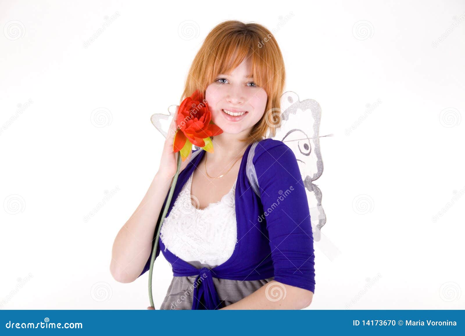 Smiling girl with a flower stock photo. Image of closeup - 14173670