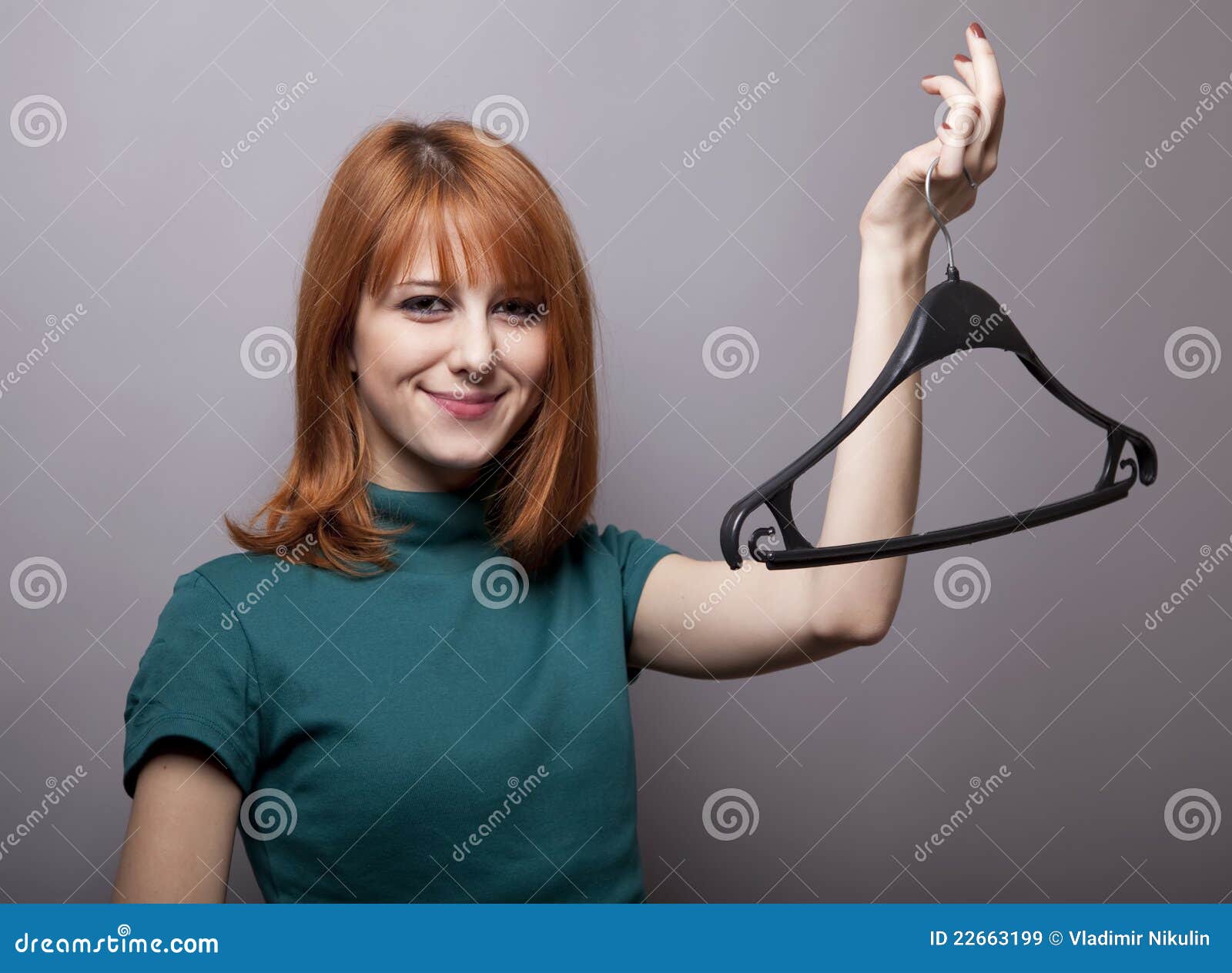 Smiling girl with hanger stock image. Image of hanger - 22663199
