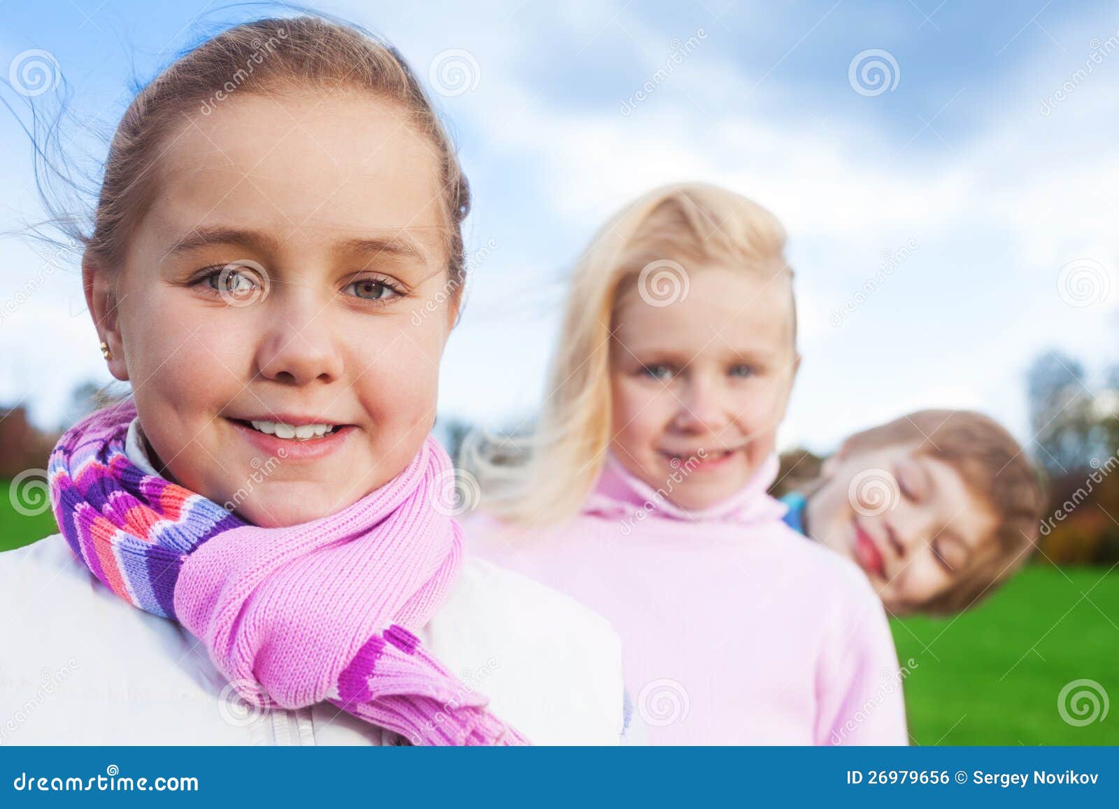Smiling Girl with Her Friends Stock Photo - Image of line, people: 26979656