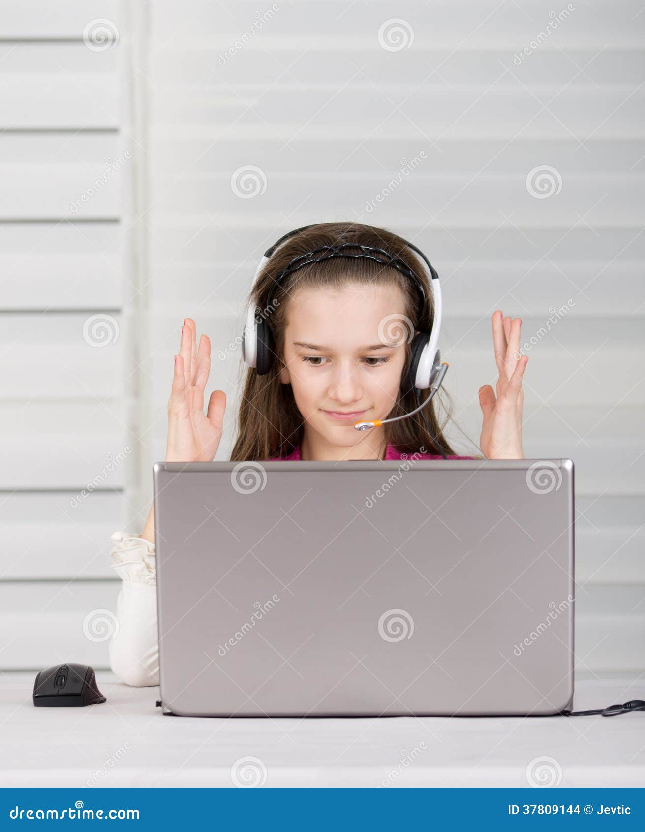 Smiling girl with laptop stock photo. Image of raised - 37809144