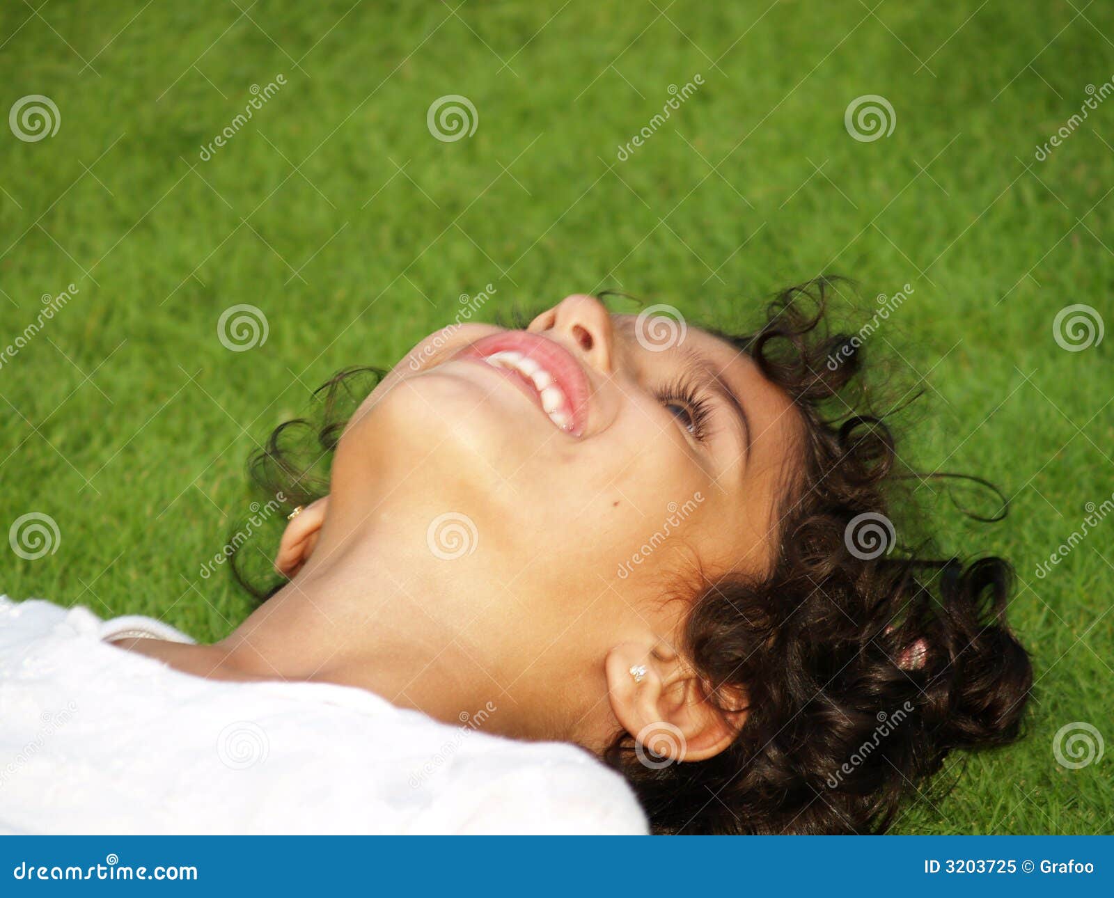 Smiling girl looking up stock image. Image of joyous, smile - 3203725