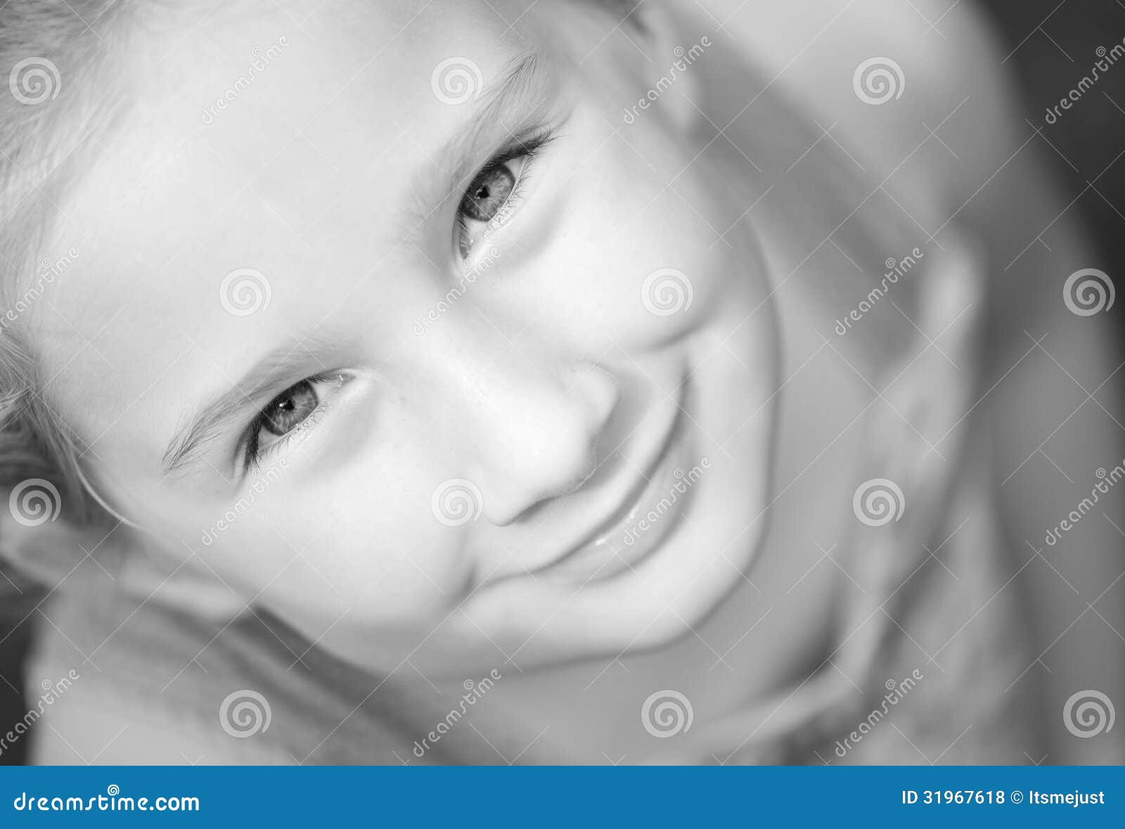 Smiling girl looking up. stock photo. Image of joyful - 31967618