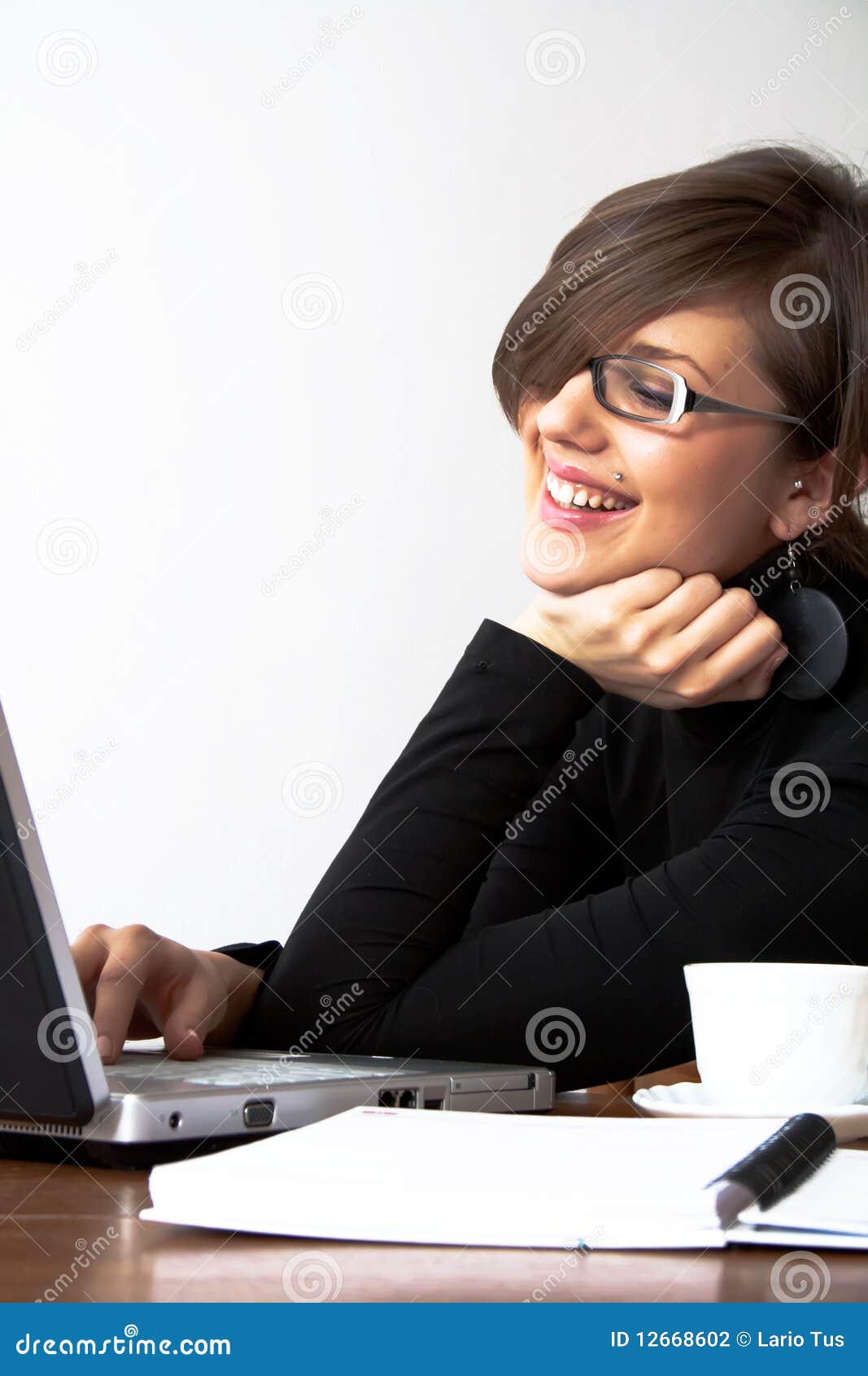 Smiling girl in the office stock photo. Image of girl - 12668602