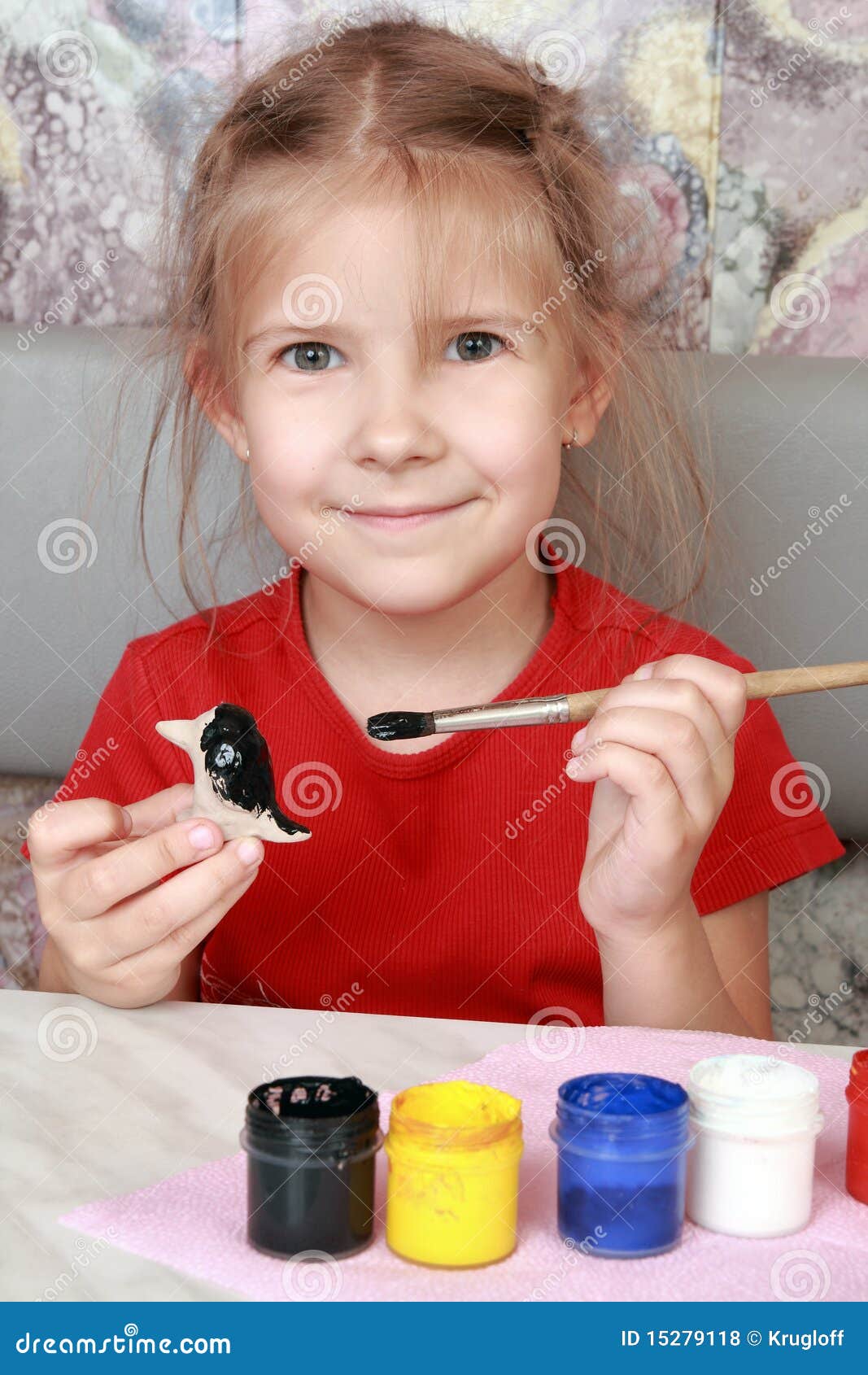 Girl Paints A White Canvas With Paint, Dirtying Her Hands And Feet With ...