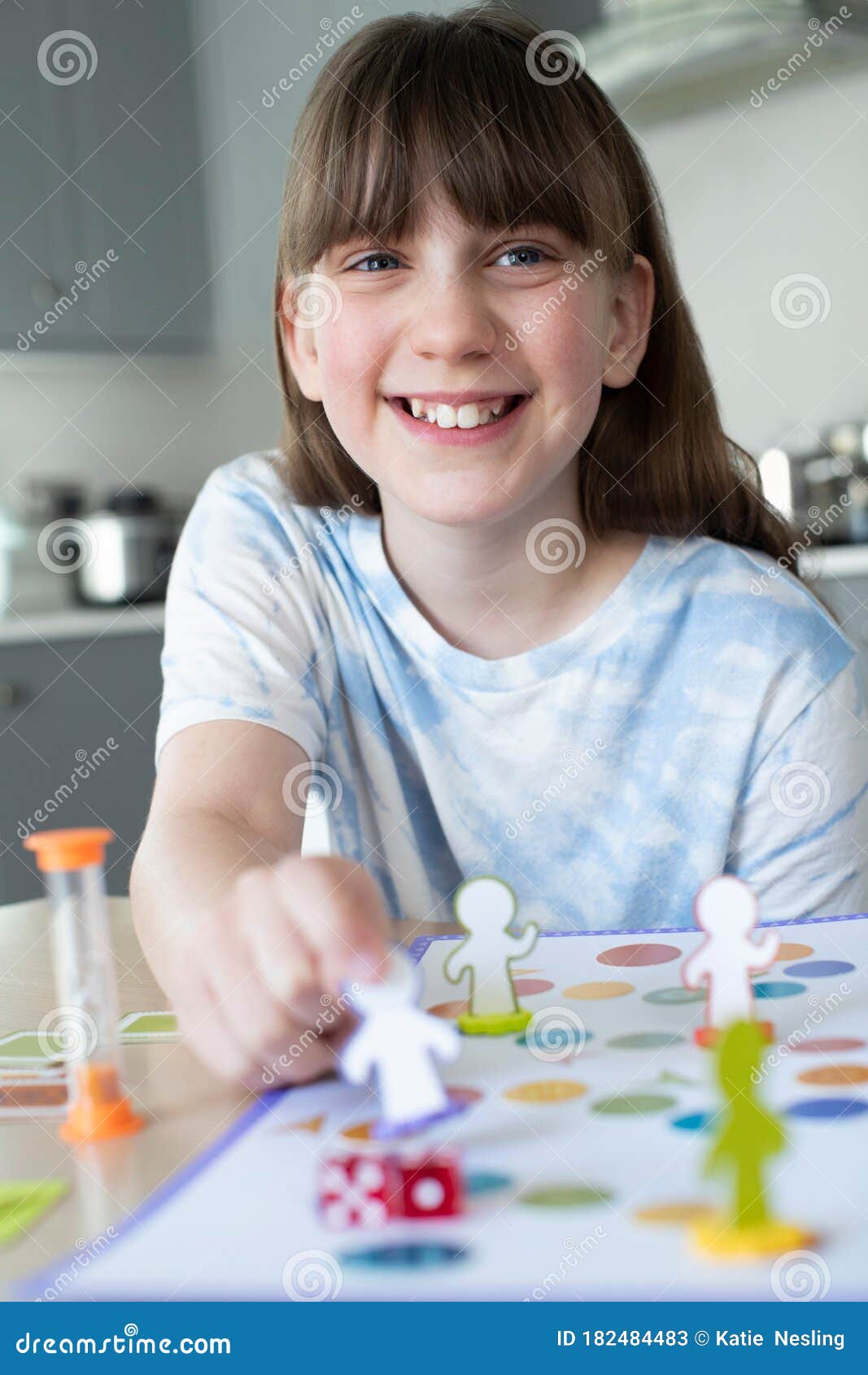 Smiling Girl Playing Generic Board Game at Home Stock Image - Image of ...