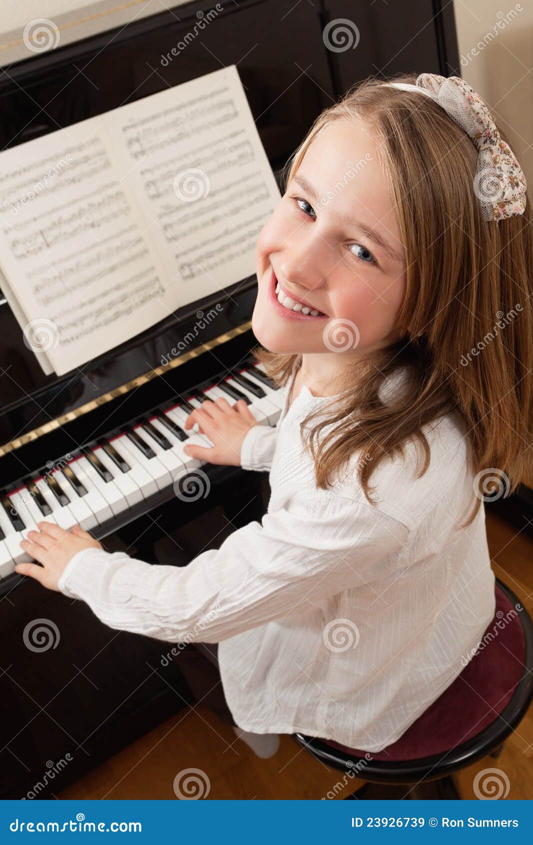 Smiling Girl Playing Her Piano Stock Image - Image of hair, person ...
