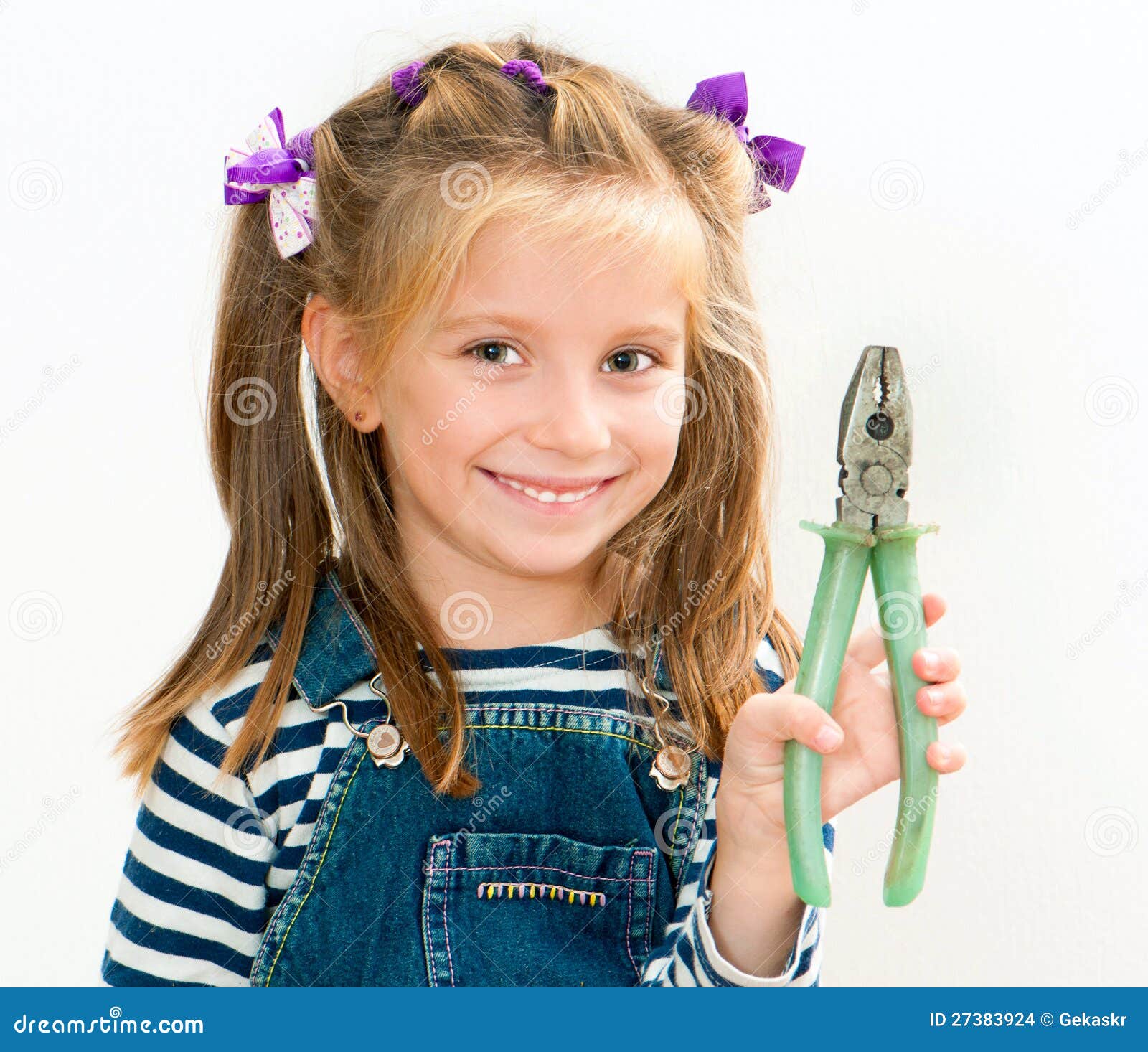 Smiling girl with pliers stock photo. Image of cute, blond - 27383924