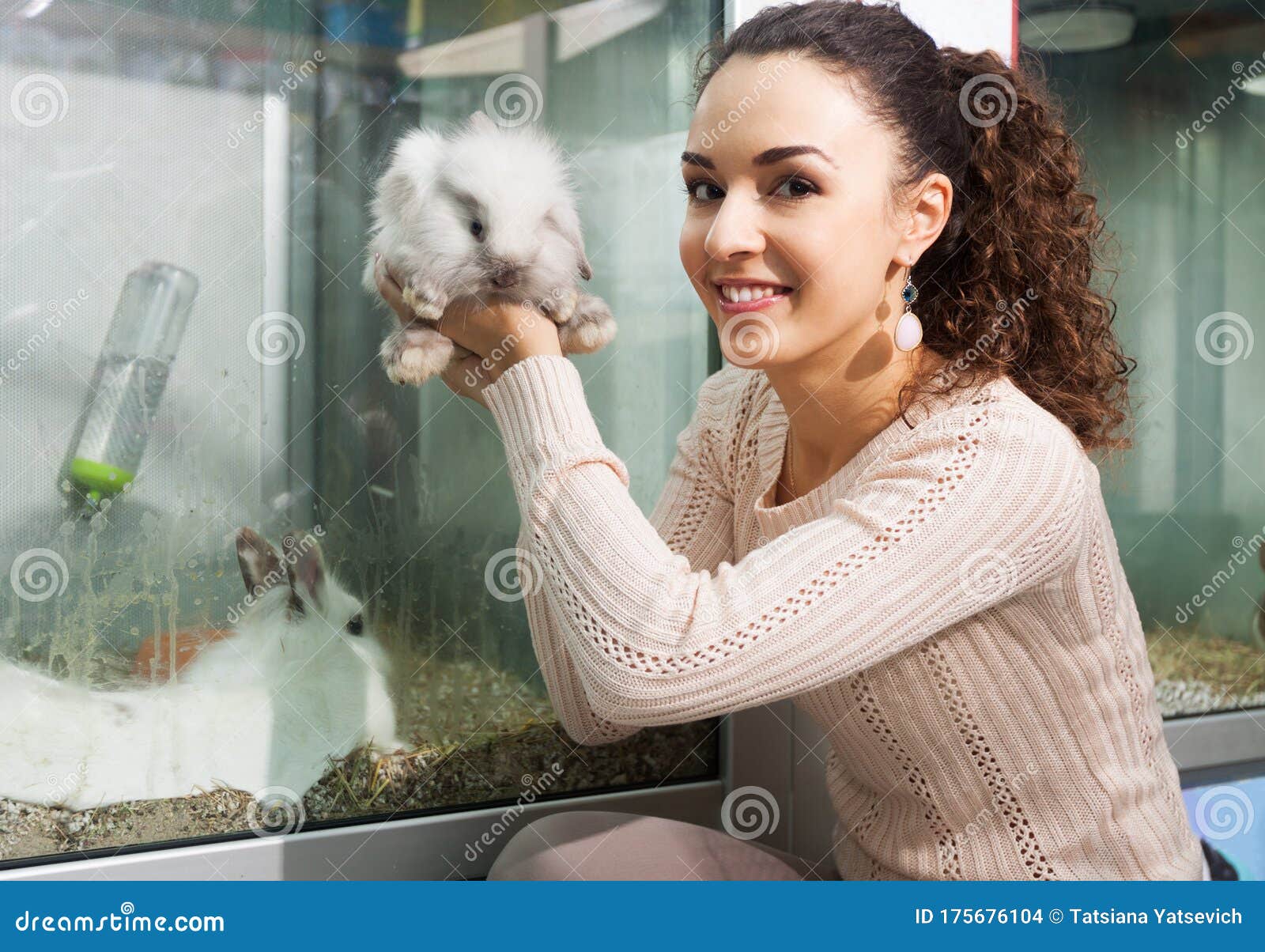 Girl posing with rabbit stock photo. Image of rabbit - 175676104