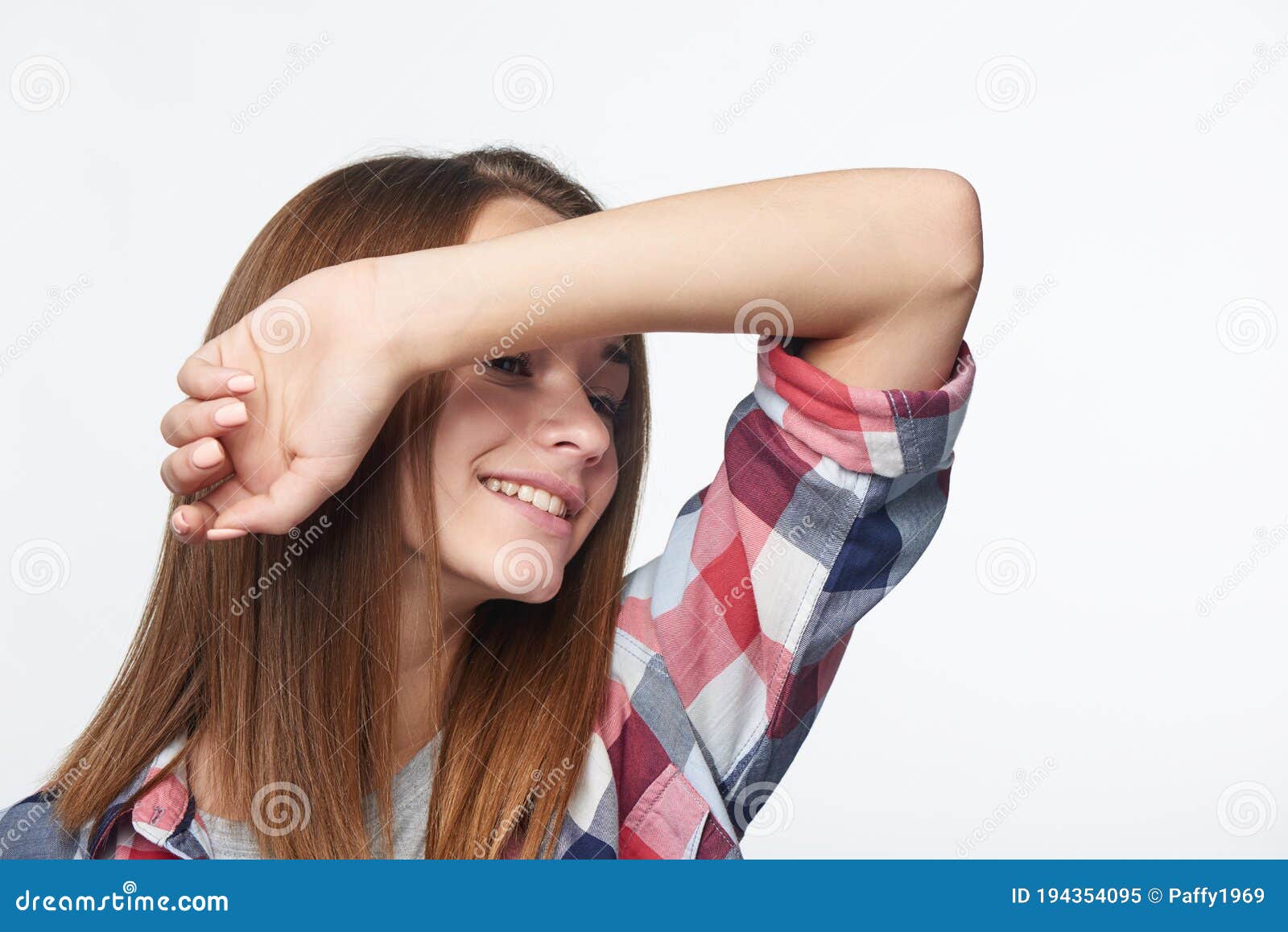 Smiling Girl with Raised Hand Shielding Eyes Stock Image - Image of ...