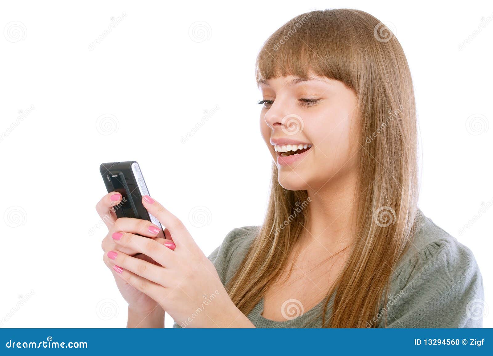 Smiling Girl Reads Message on Phone Stock Photo - Image of conversation ...