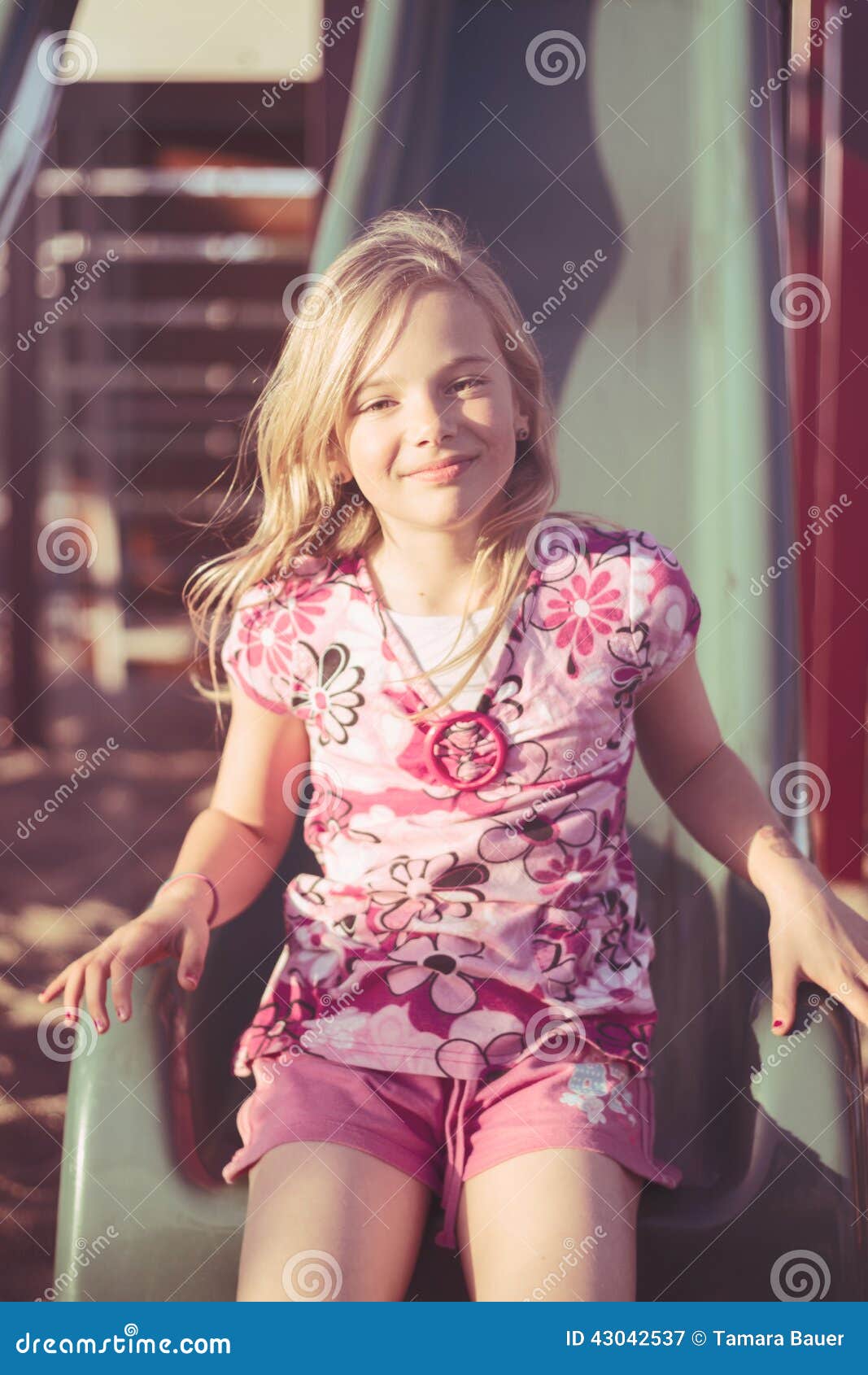 Smiling girl on slide stock image. Image of playground - 43042537