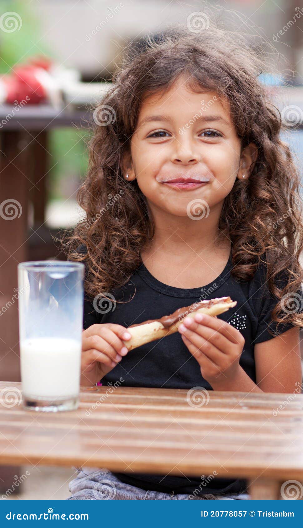 Smiling girl snacking stock image. Image of drinking - 20778057