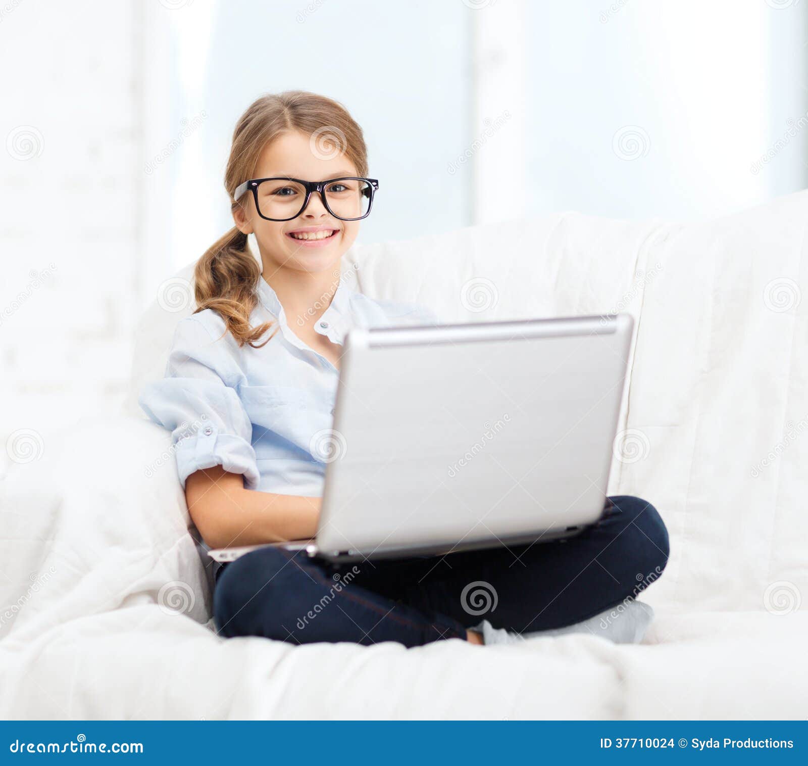 Smiling Girl in Specs with Laptop Computer at Home Stock Photo - Image ...