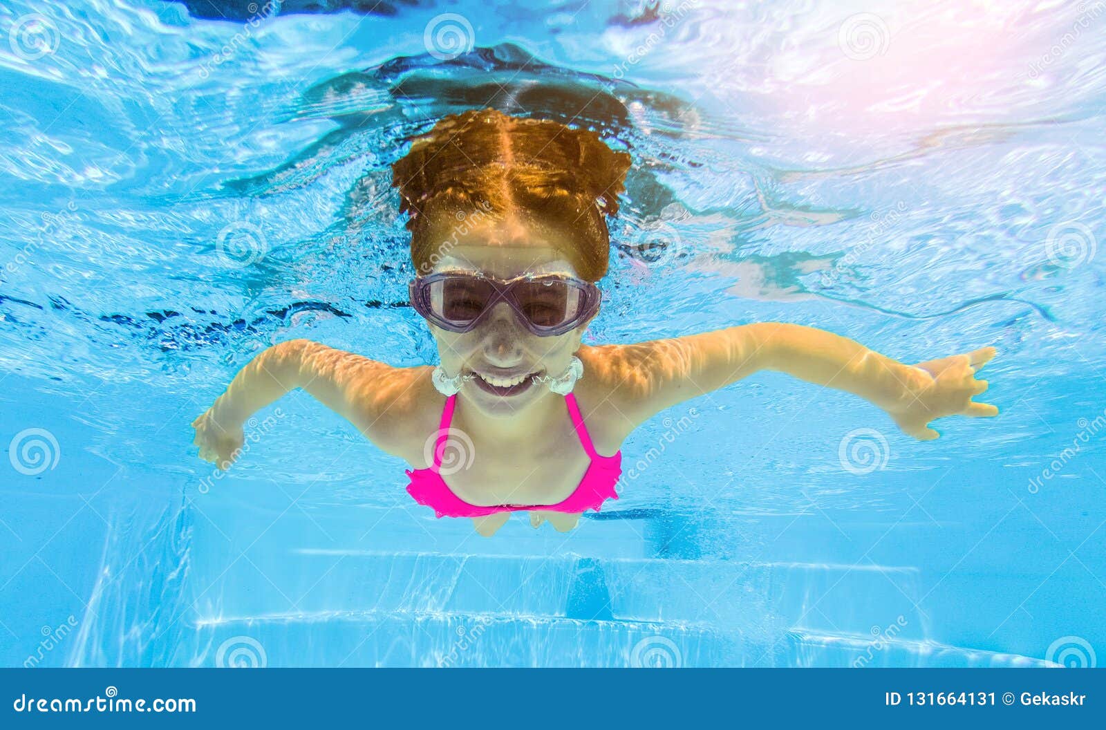 Smiling Girl Swimming Underwater In Pool Stock Image Image Of