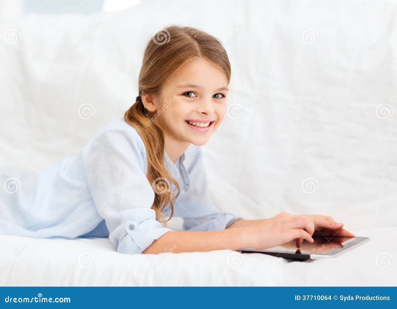Smiling Girl with Tablet Computer at Home Stock Photo - Image of happy ...
