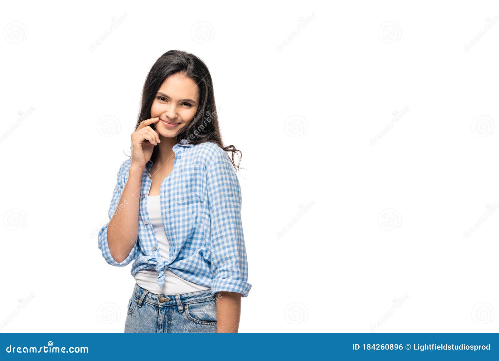 Smiling Girl Touching Face And Looking At Camera Isolated On White