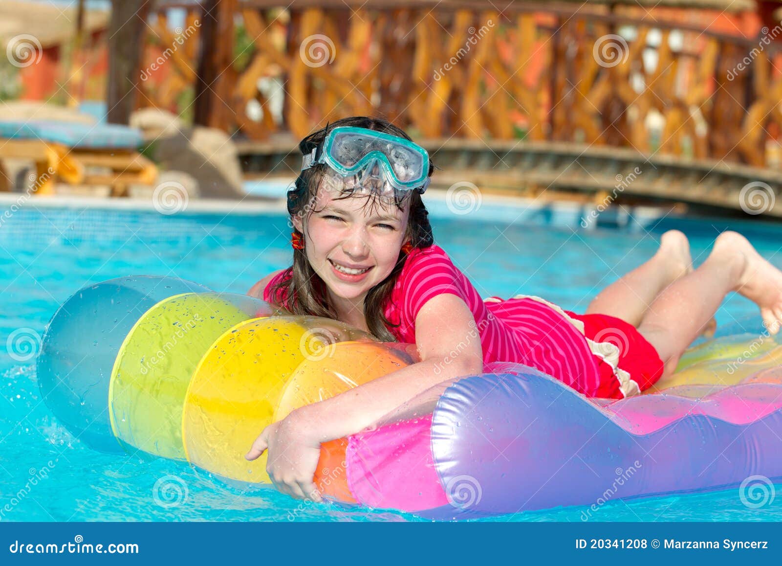 Smiling Girl on Water Raft stock photo. Image of inflatable - 20341208