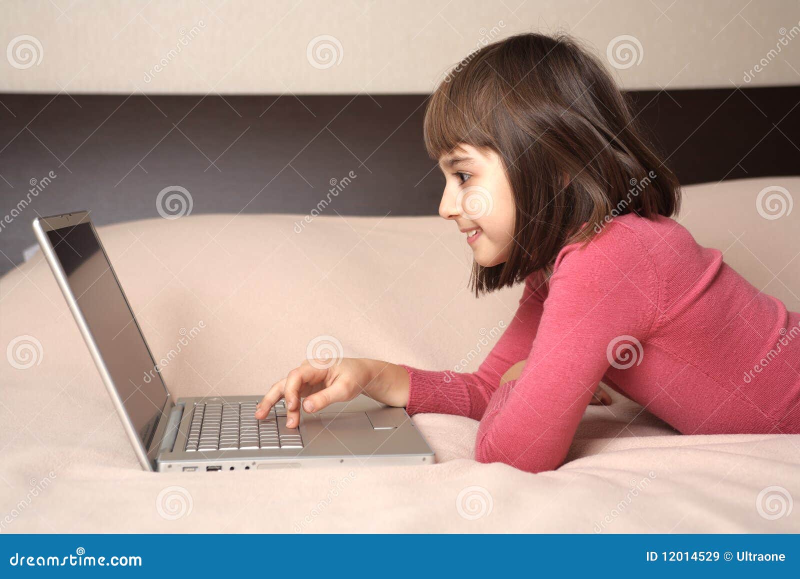 Smiling Girl Working on Laptop Stock Image - Image of silver, smiling ...